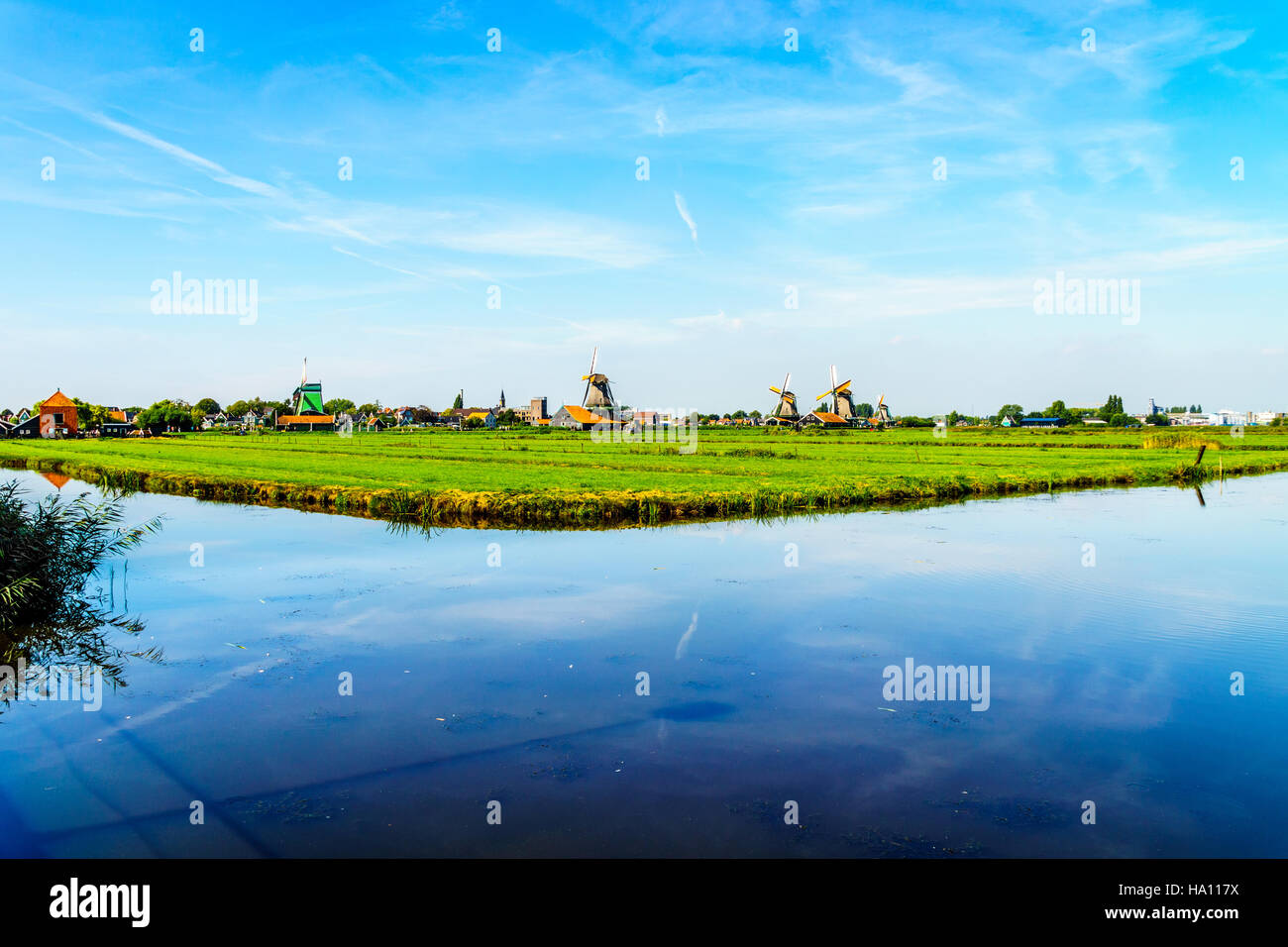 Typical Dutch Landscape with open Fields, Canals and Dutch Windmill at ...