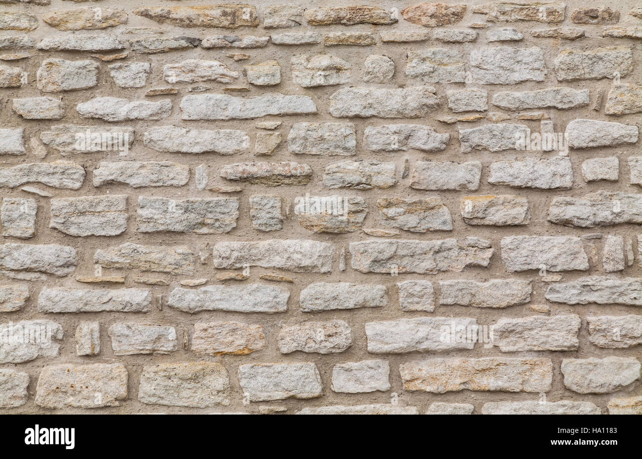 Stone wall texture background natural color. Closeup Stock Photo - Alamy