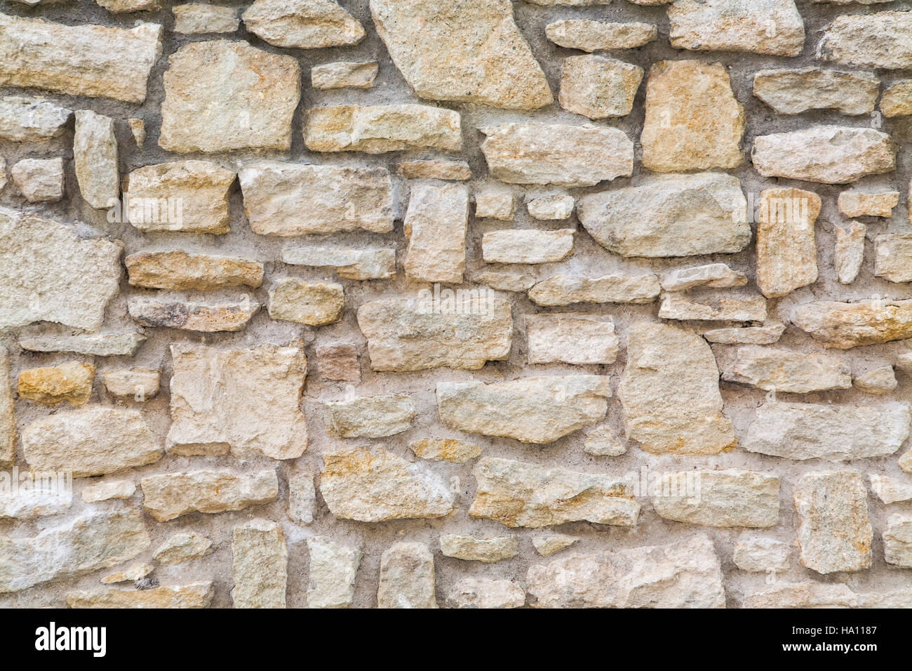 Stone wall texture background natural color. Closeup Stock Photo - Alamy