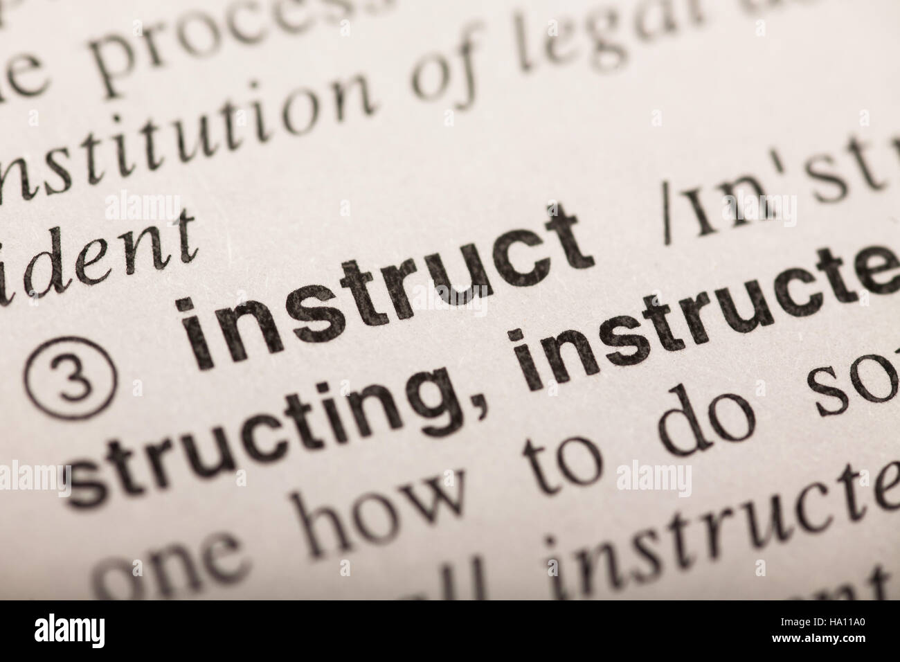 instruct - word in dictionary Stock Photo - Alamy