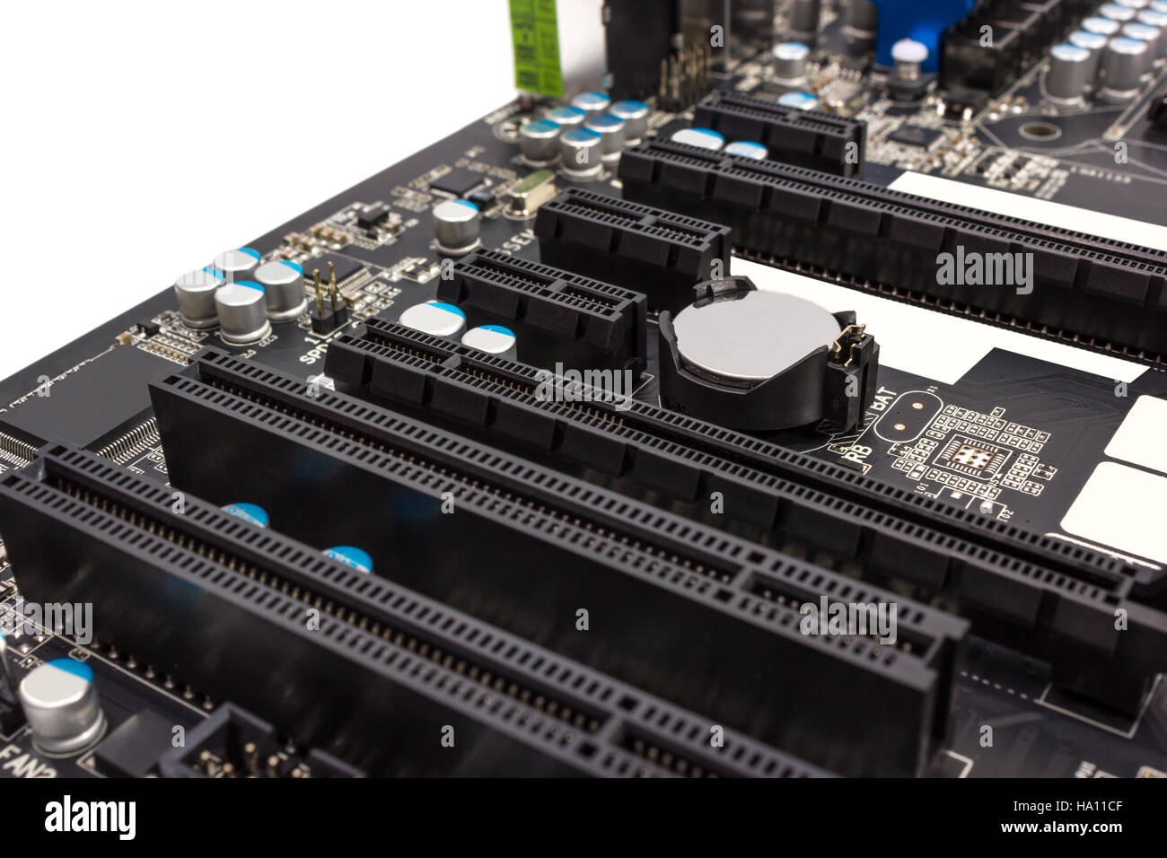 Electronics components on modern PC computer motherboard with PCI ...