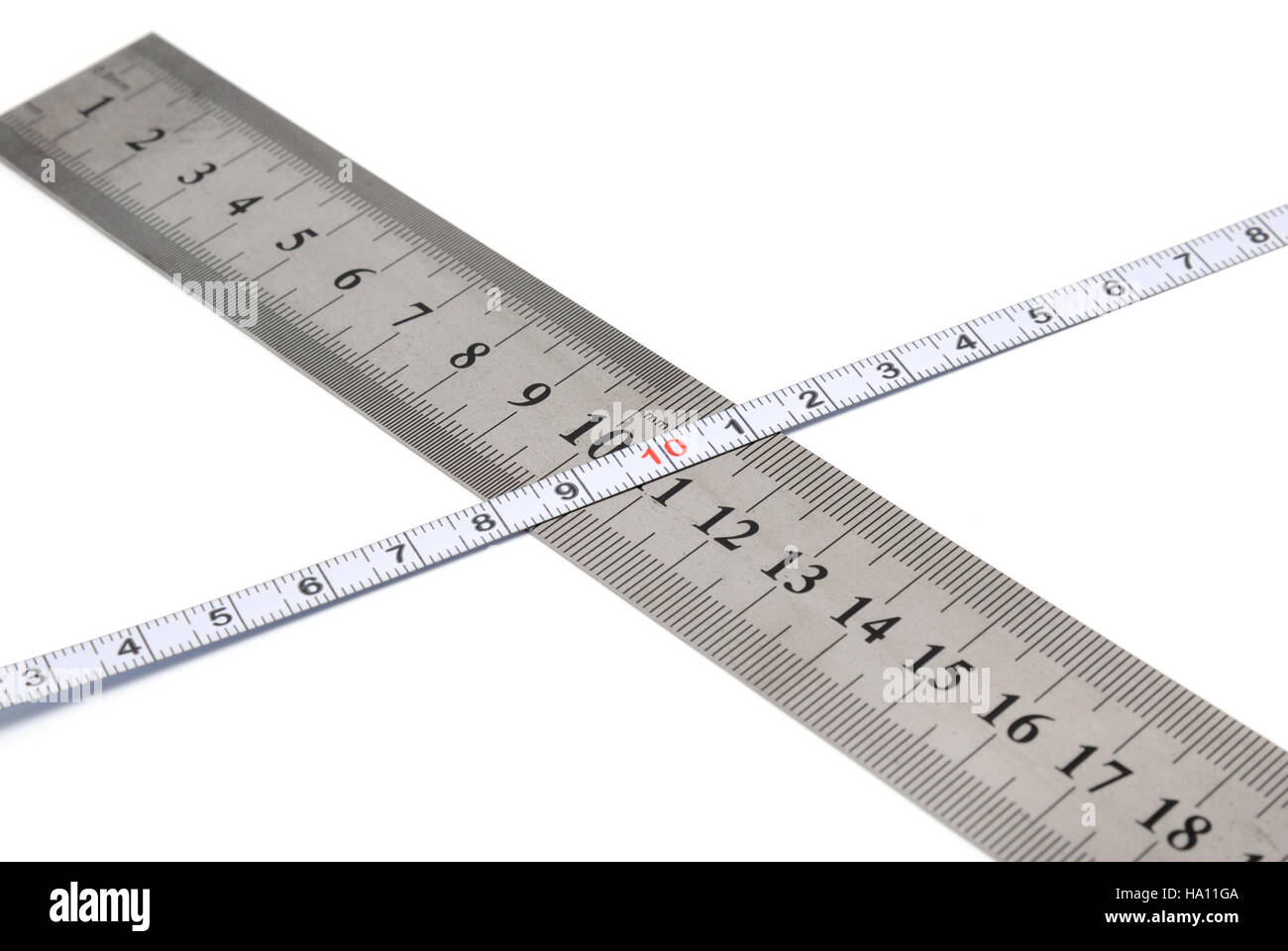 White metal ruler and measuring tape on a white background Stock Photo ...