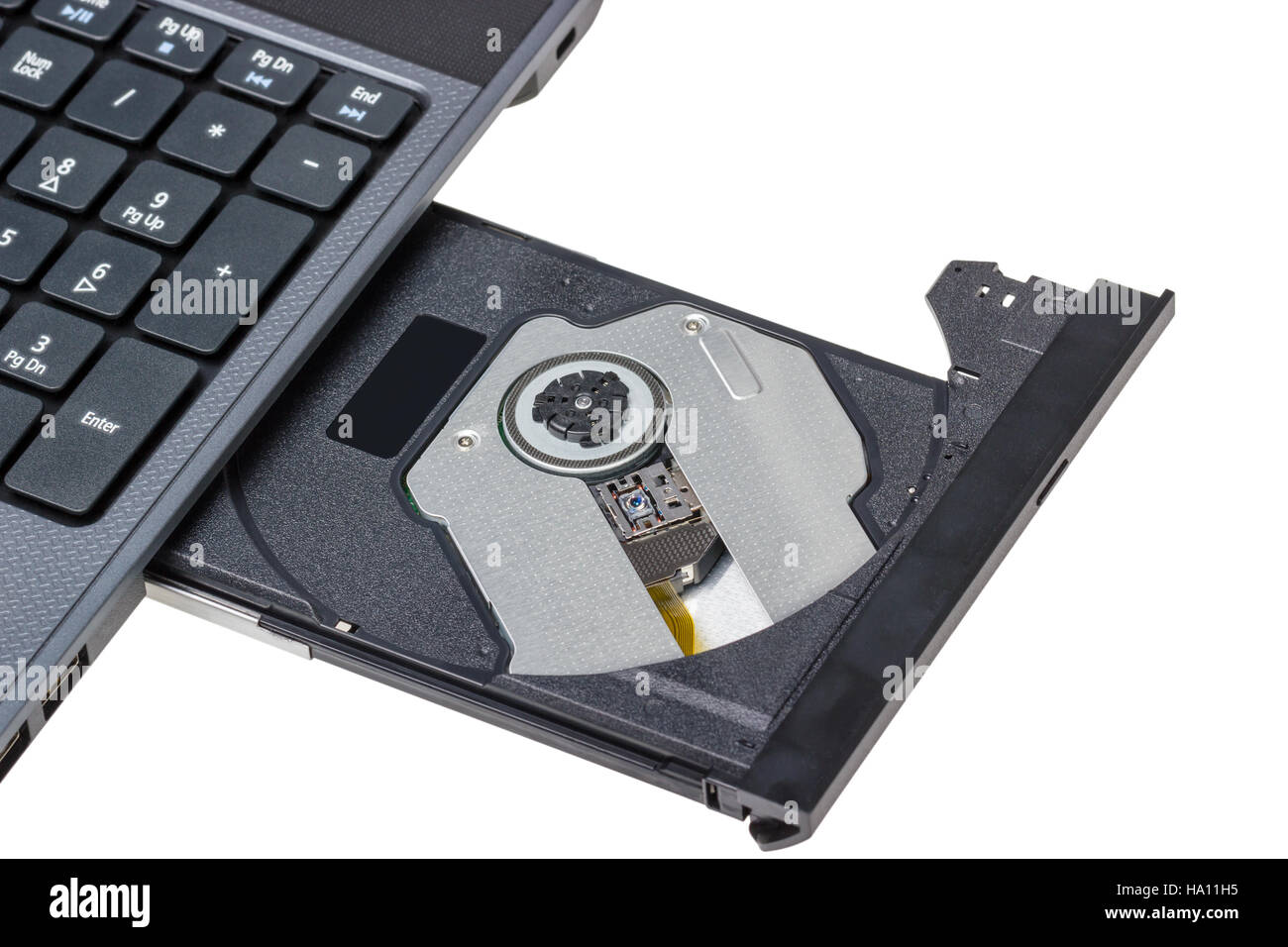 Electronic collection - Laptop with open DVD tray isolated on a white ...