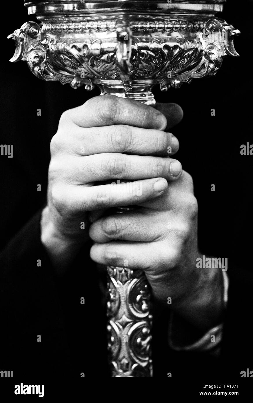 Man holding a grail during the catholic parade semana santa eastern ...