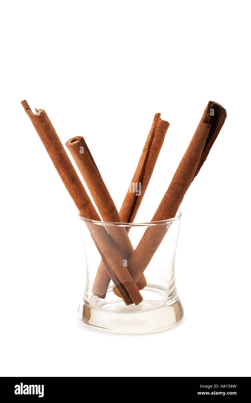 closeup Cinnamon stick spice in a glass isolated on white background ...