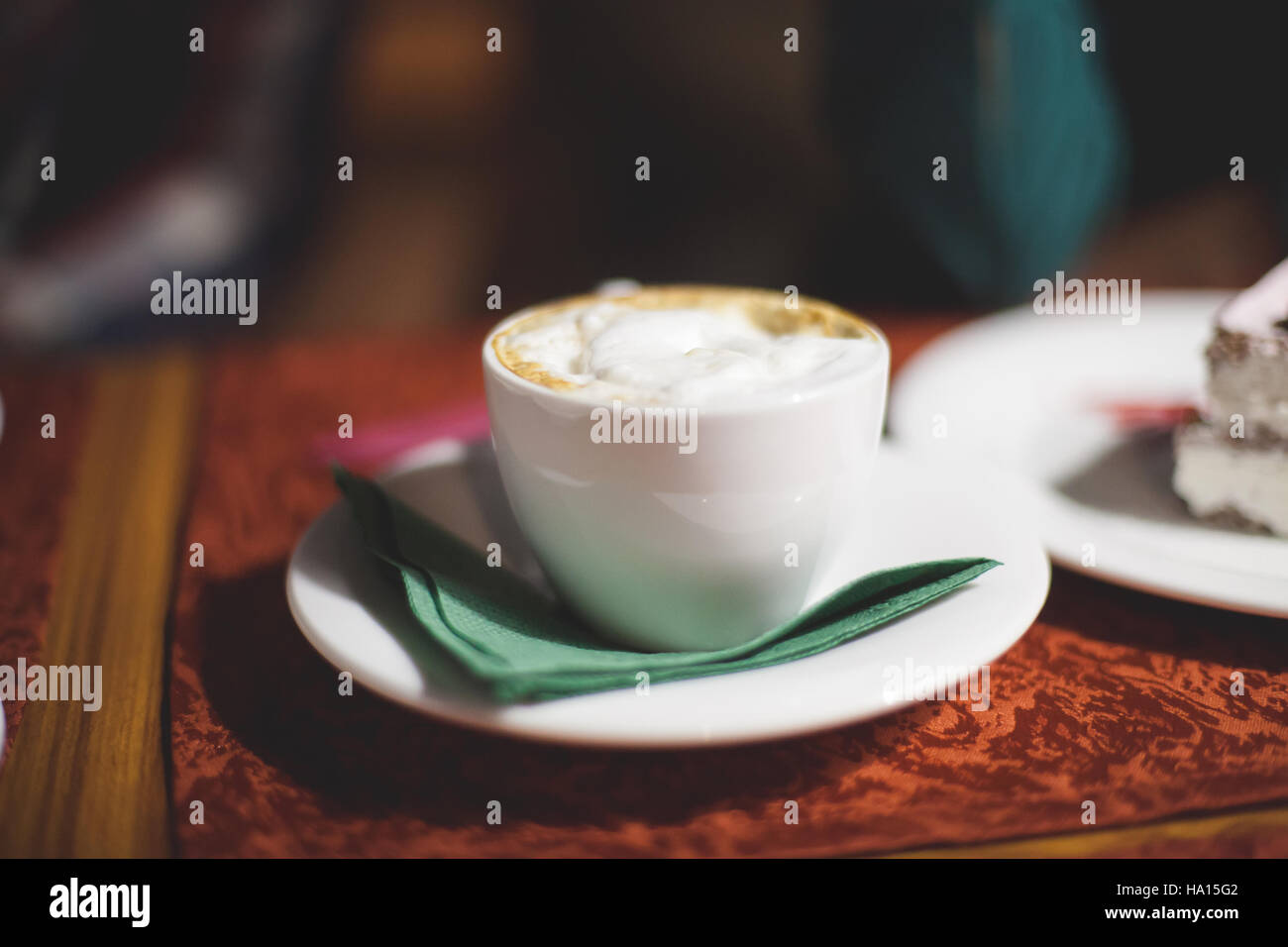 Flat white cup of coffee latte, close up, shallow dof Stock Photo - Alamy