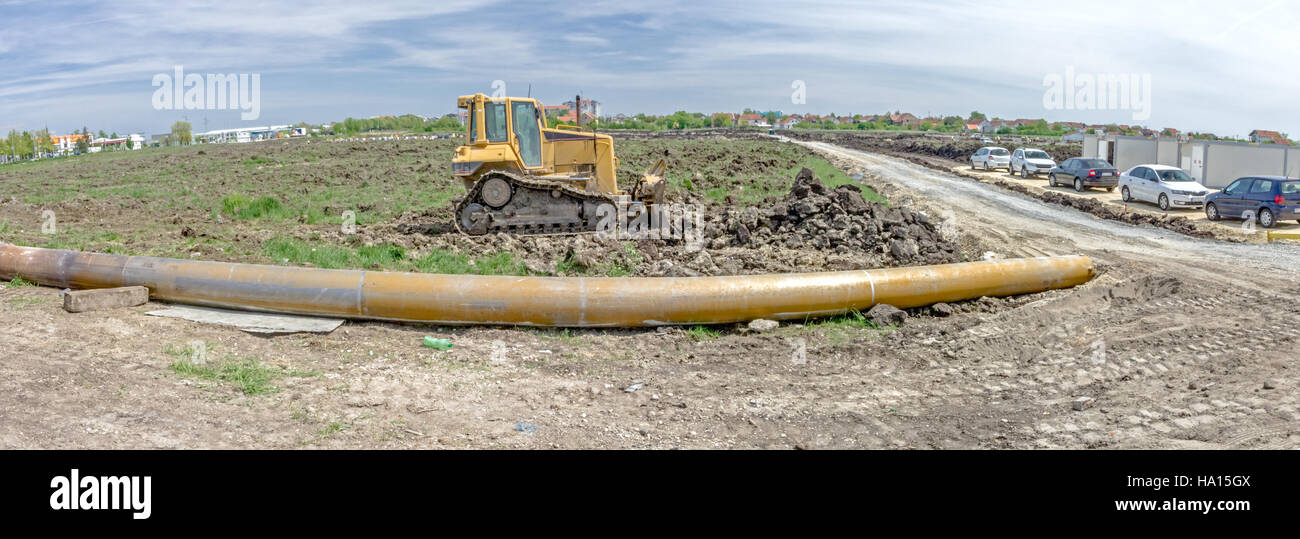 Panorama is showing with heavy earth mover construction machine ...
