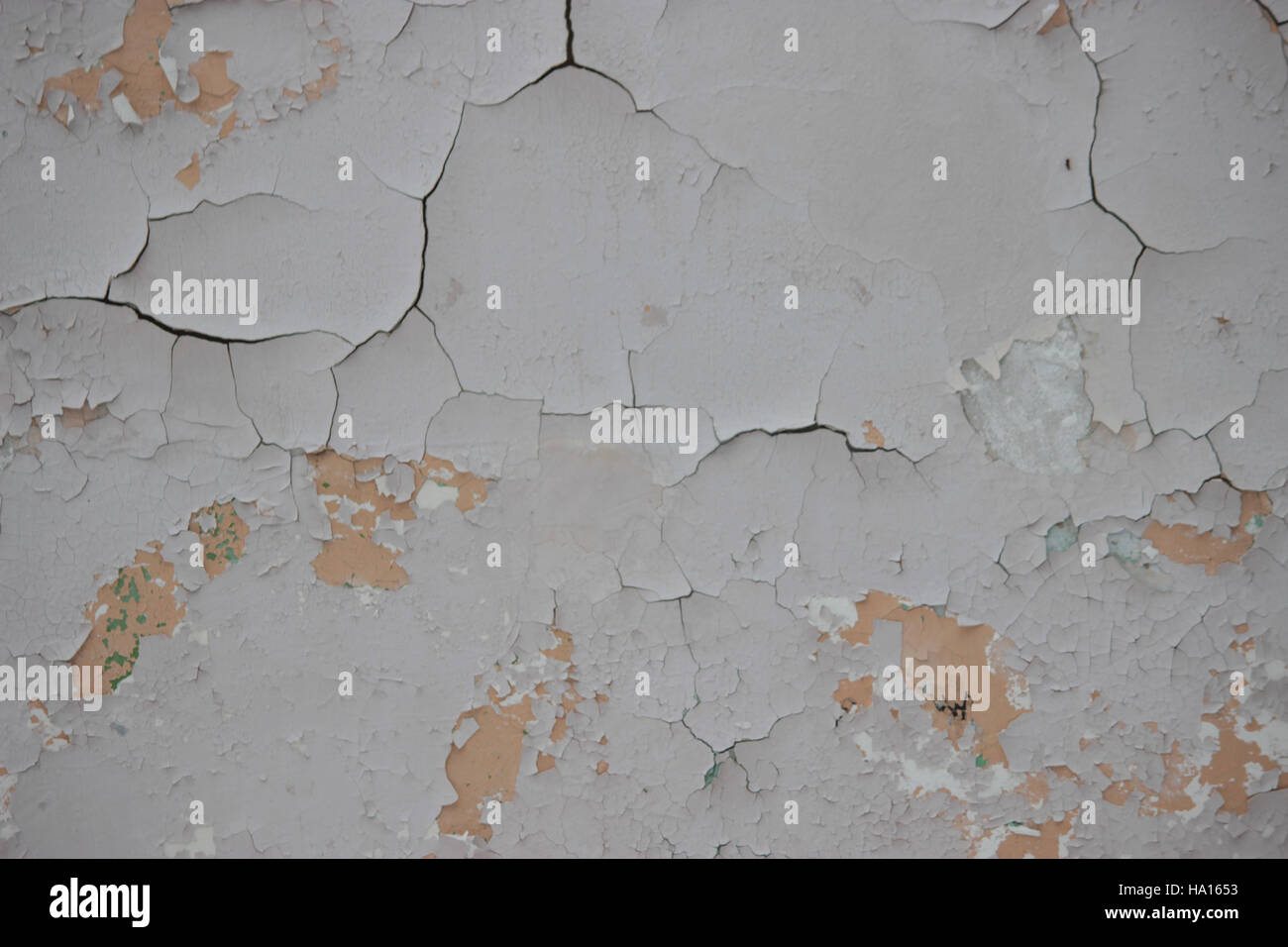 old cracked damaged plaster wall background Stock Photo - Alamy