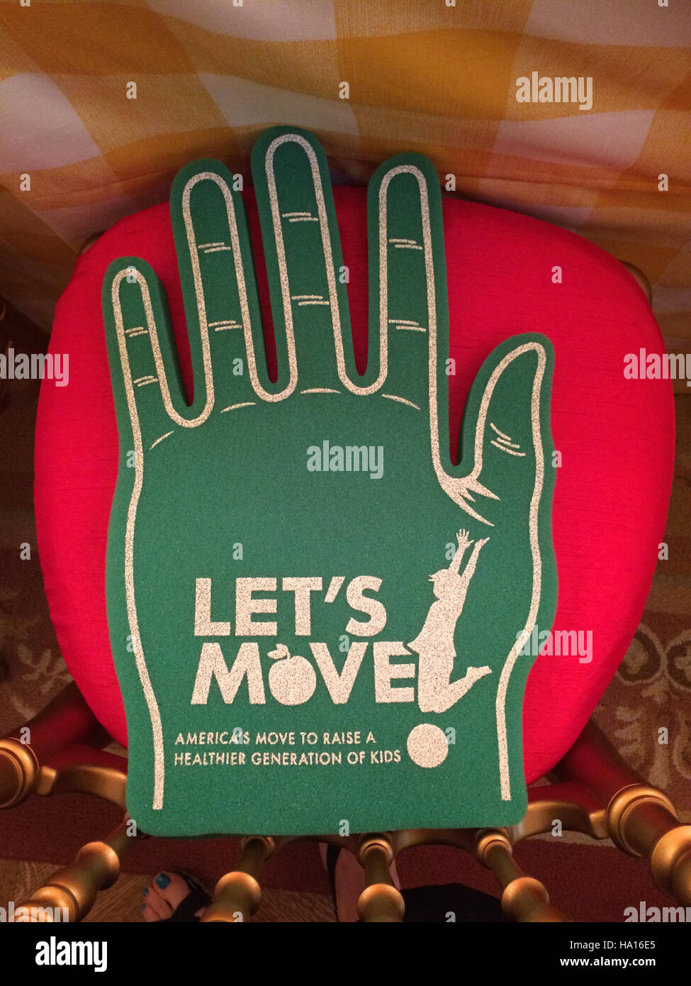 The image captures a foam hand from the 'Let's Move' initiative ...