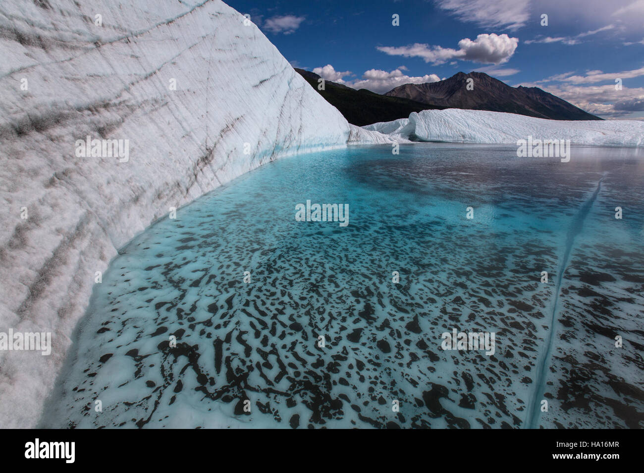 The pool on the Root Glacier, located in Wrangell-St. Elias National ...