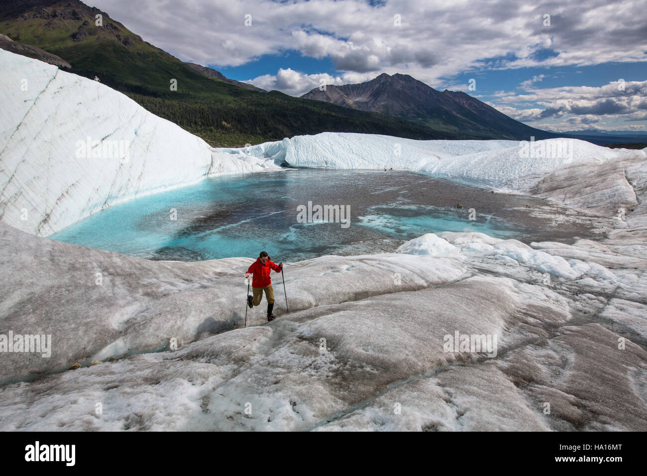 Backpackers explore the Root Glacier in Alaska, an iconic destination ...