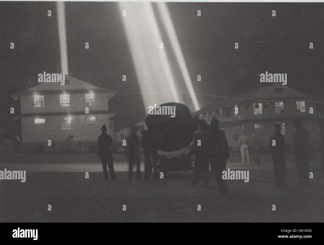 A photograph of a WWII era scene, showcasing military operations during ...