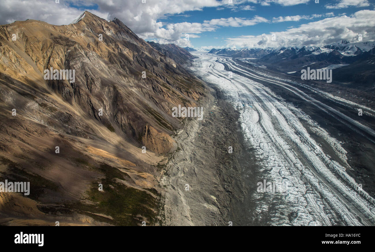 This aerial view showcases Mount Chitina and Logan Glacier in Alaska ...
