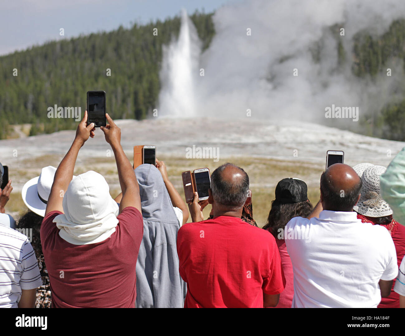 Photographers capture the iconic eruption of Old Faithful Geyser in ...
