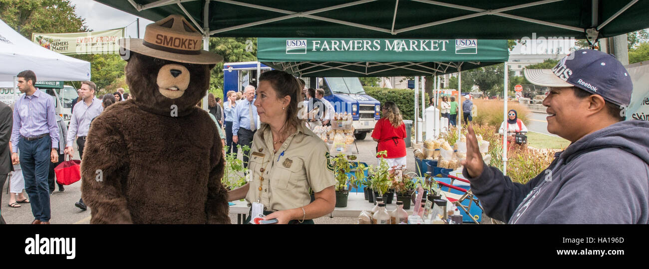 This image features Dr. Gregory Parham at the USDA Farmers Market ...