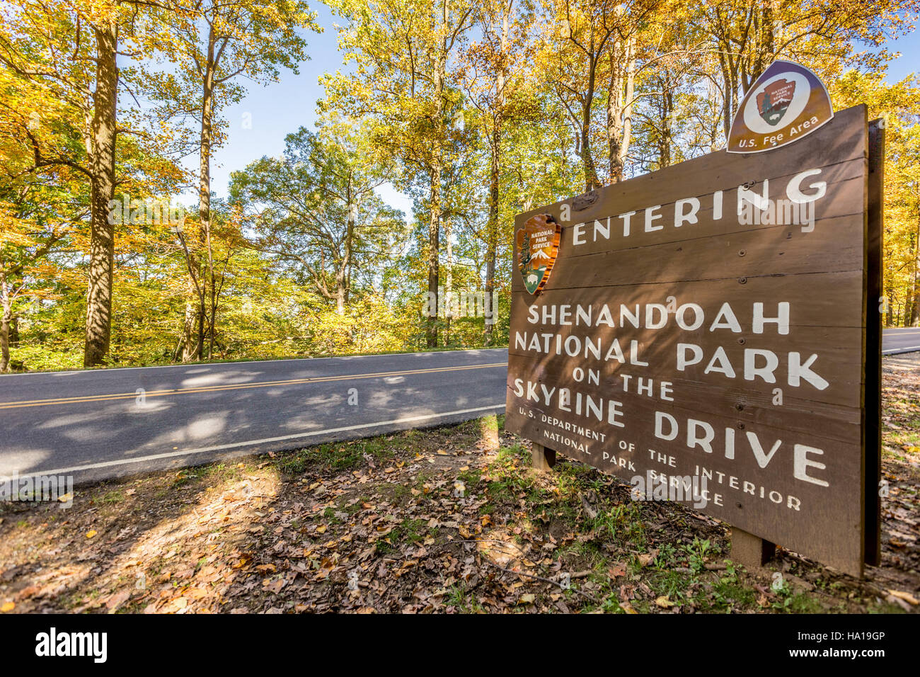 This image features a 'Now Entering' sign marking the entrance to a ...