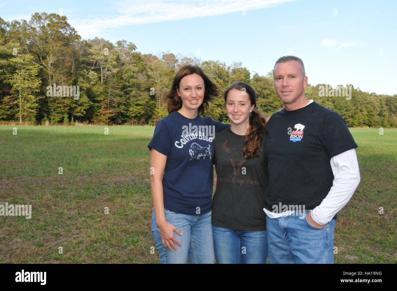 The Lester family, demonstrating sustainable farming practices, poses ...