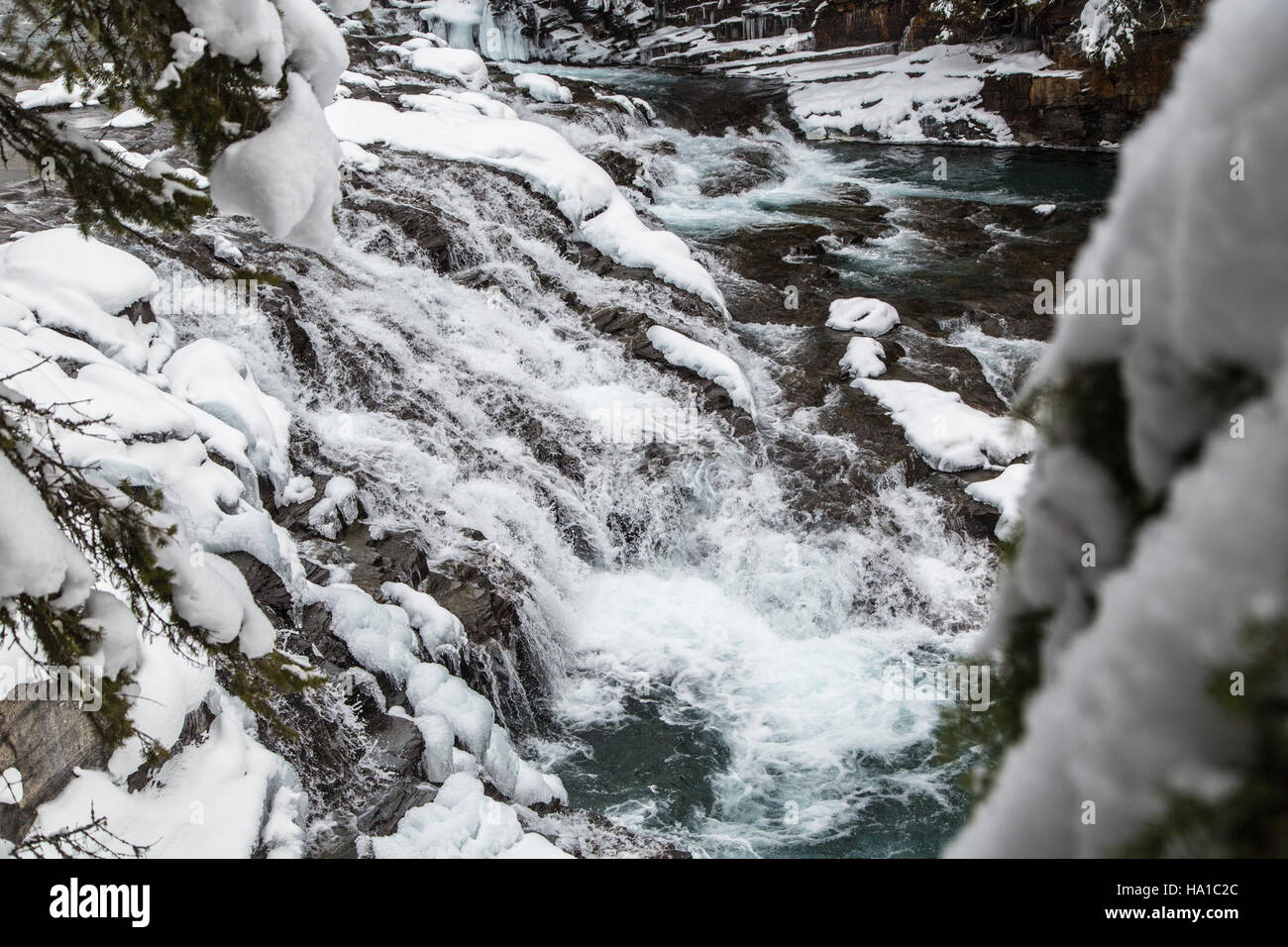 Sacred Dancing Cascades, located in Glacier National Park, are depicted ...