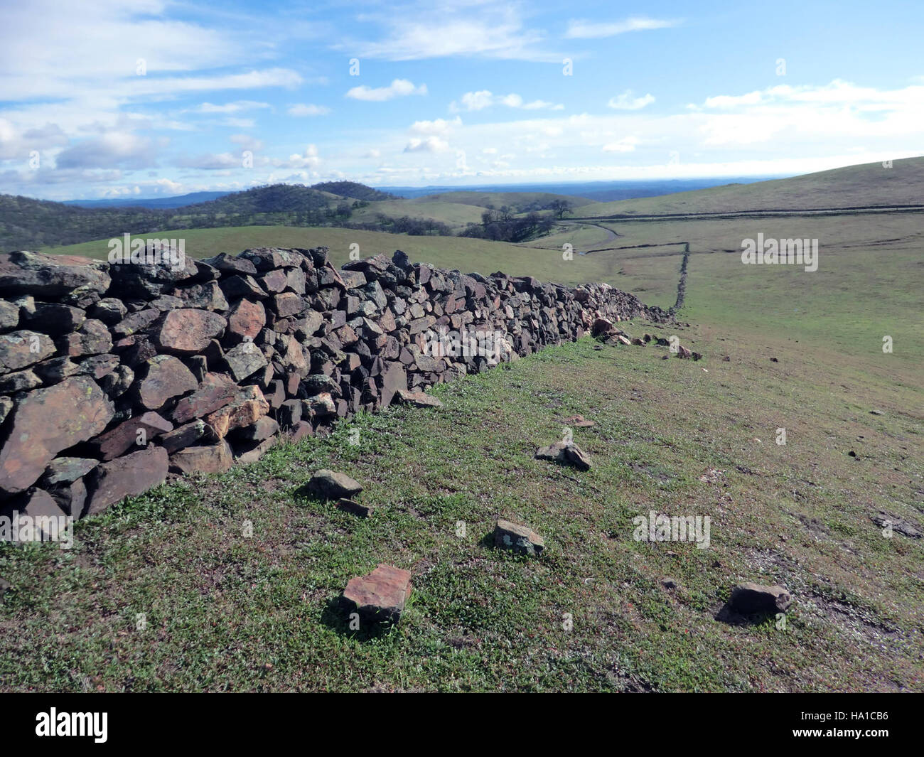 A historic stone wall at Quick Ranch, highlighting its importance in ...