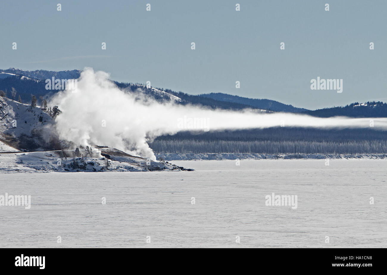Steam rises from Steamboat Point, one of Yellowstone National Park’s ...