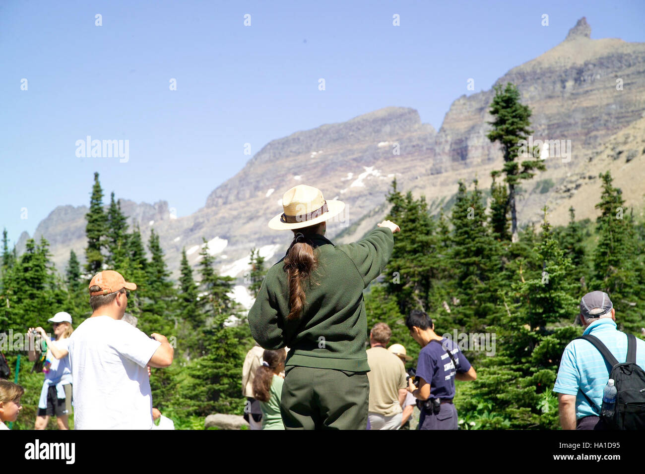 A park ranger delivering an informative talk at Glacier National Park ...