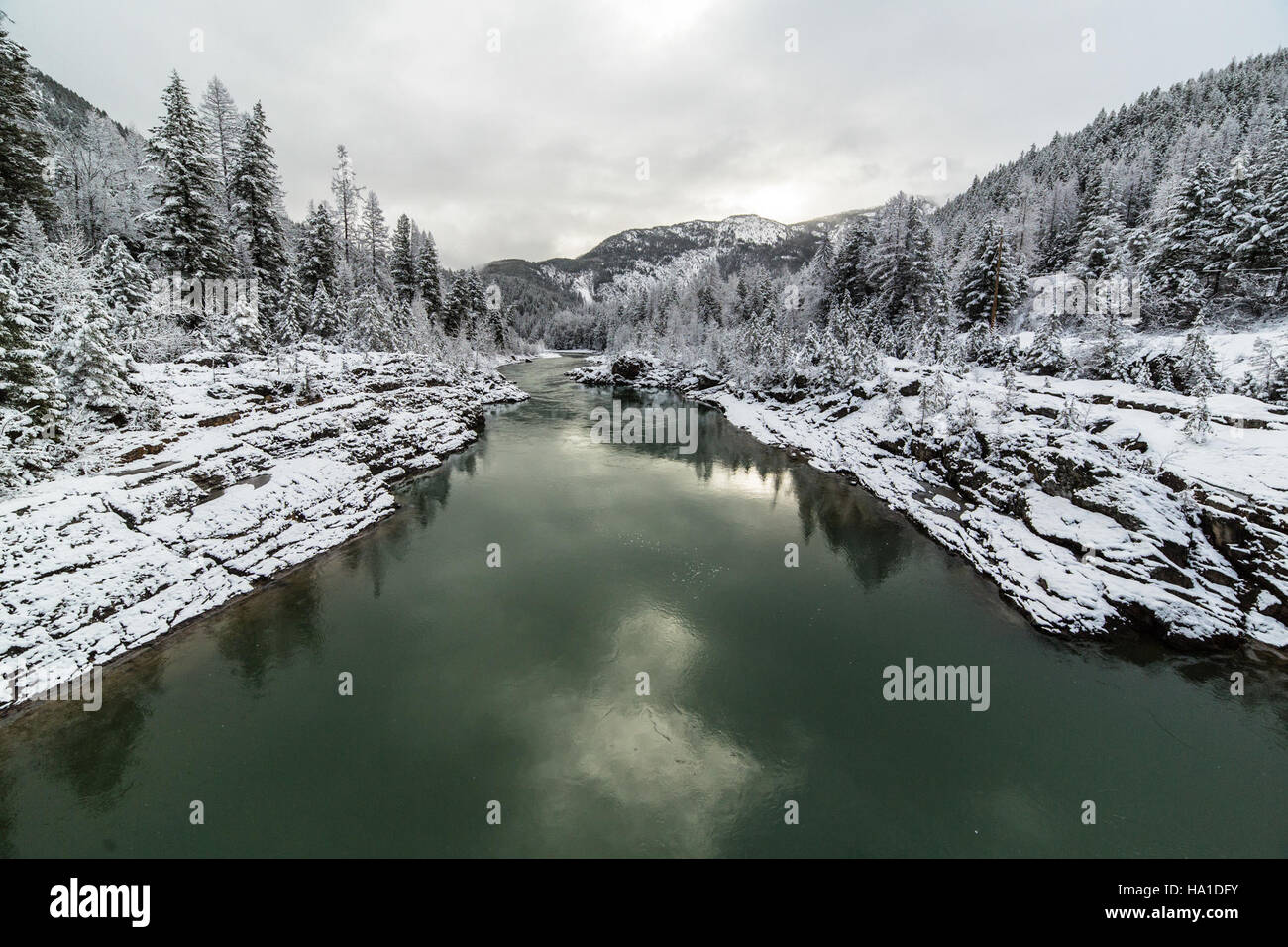 A winter morning view of the Middle Fork in Glacier National Park ...