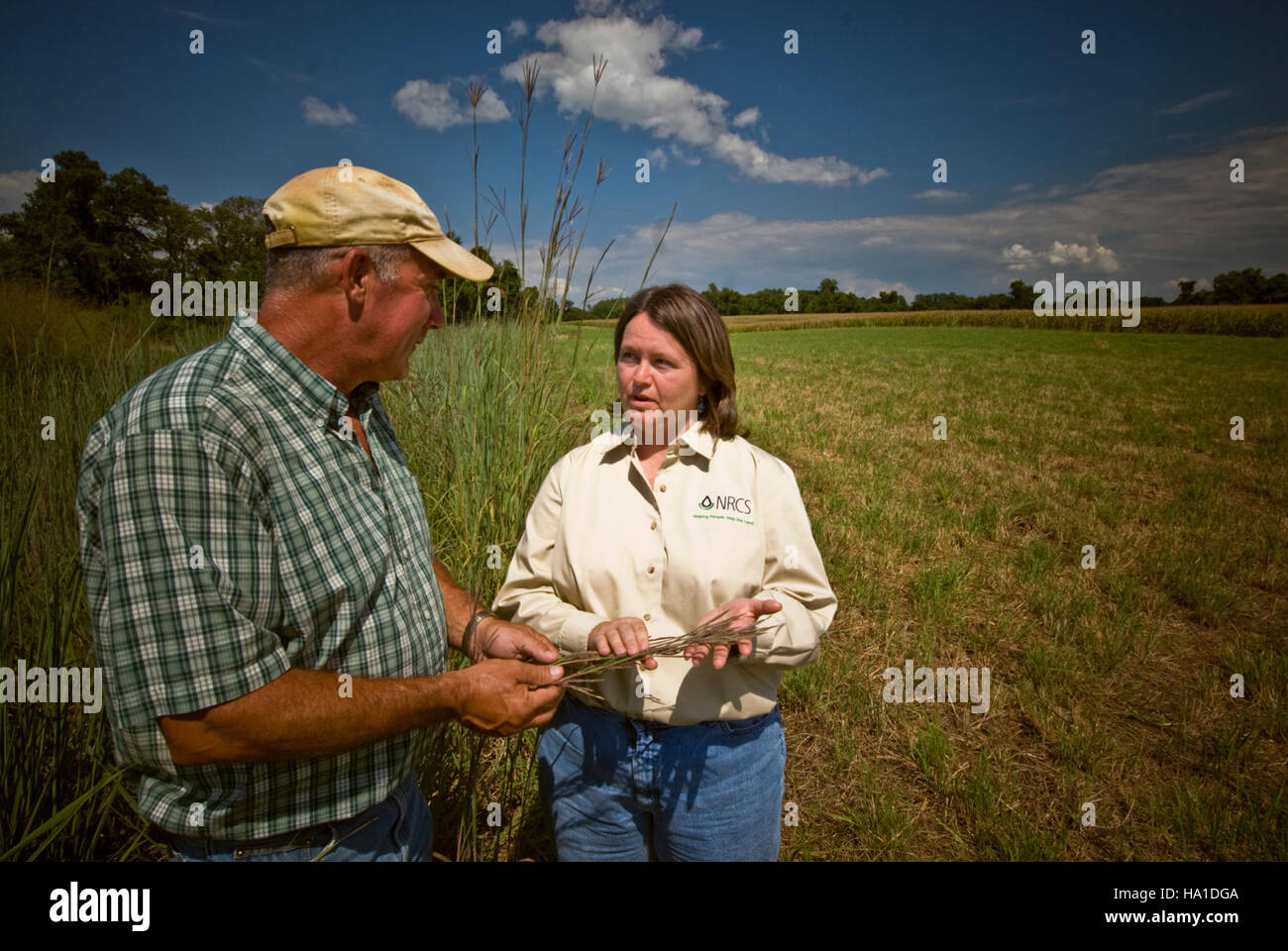 A farmer works alongside an NRCS (Natural Resources Conservation ...