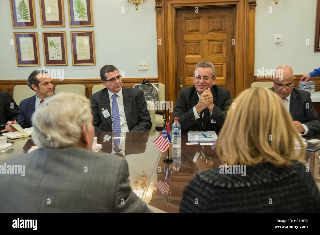 The image shows a meeting between Cuban Minister of Agriculture Gustavo ...