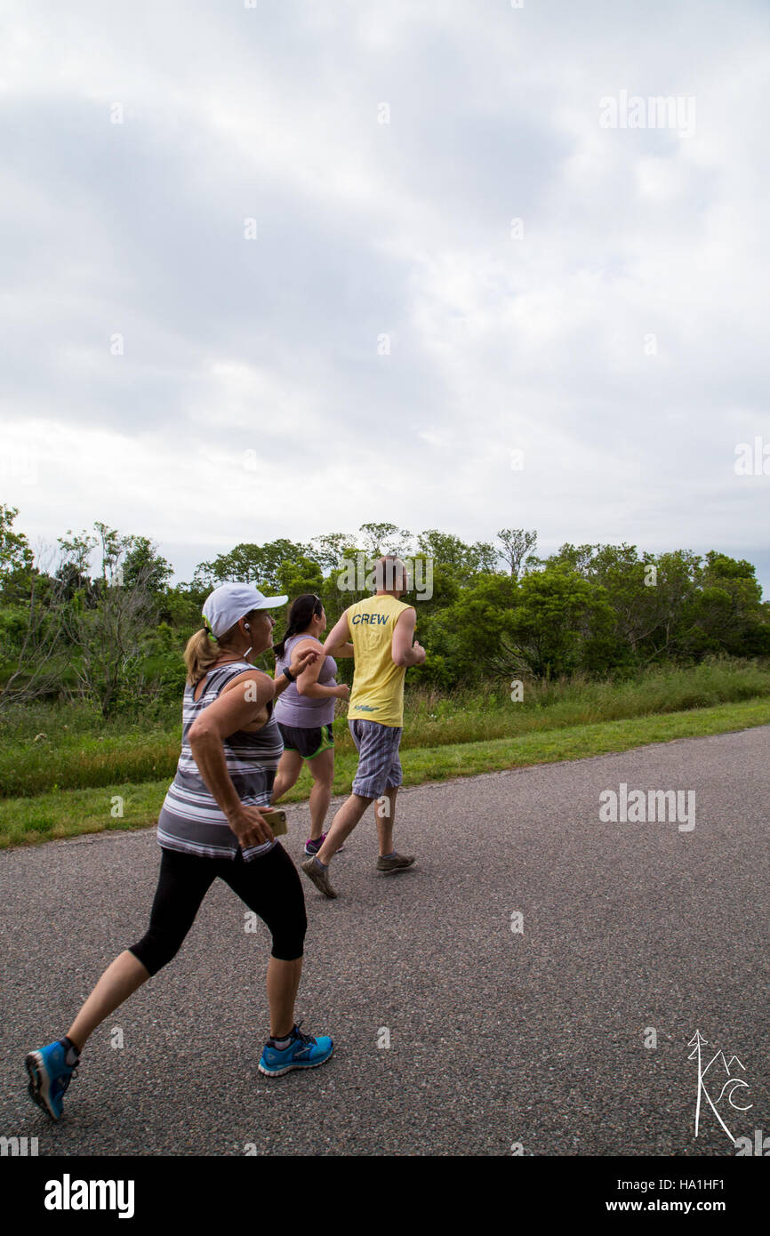 This image captures participants in the 5K Centennial Run at Assateague ...
