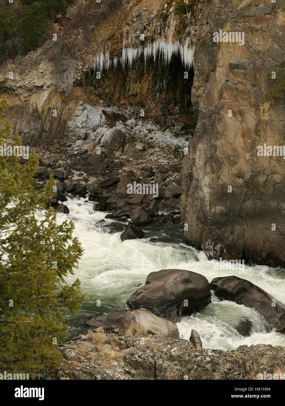 This image shows a cave along the Yellowstone River, a geological ...