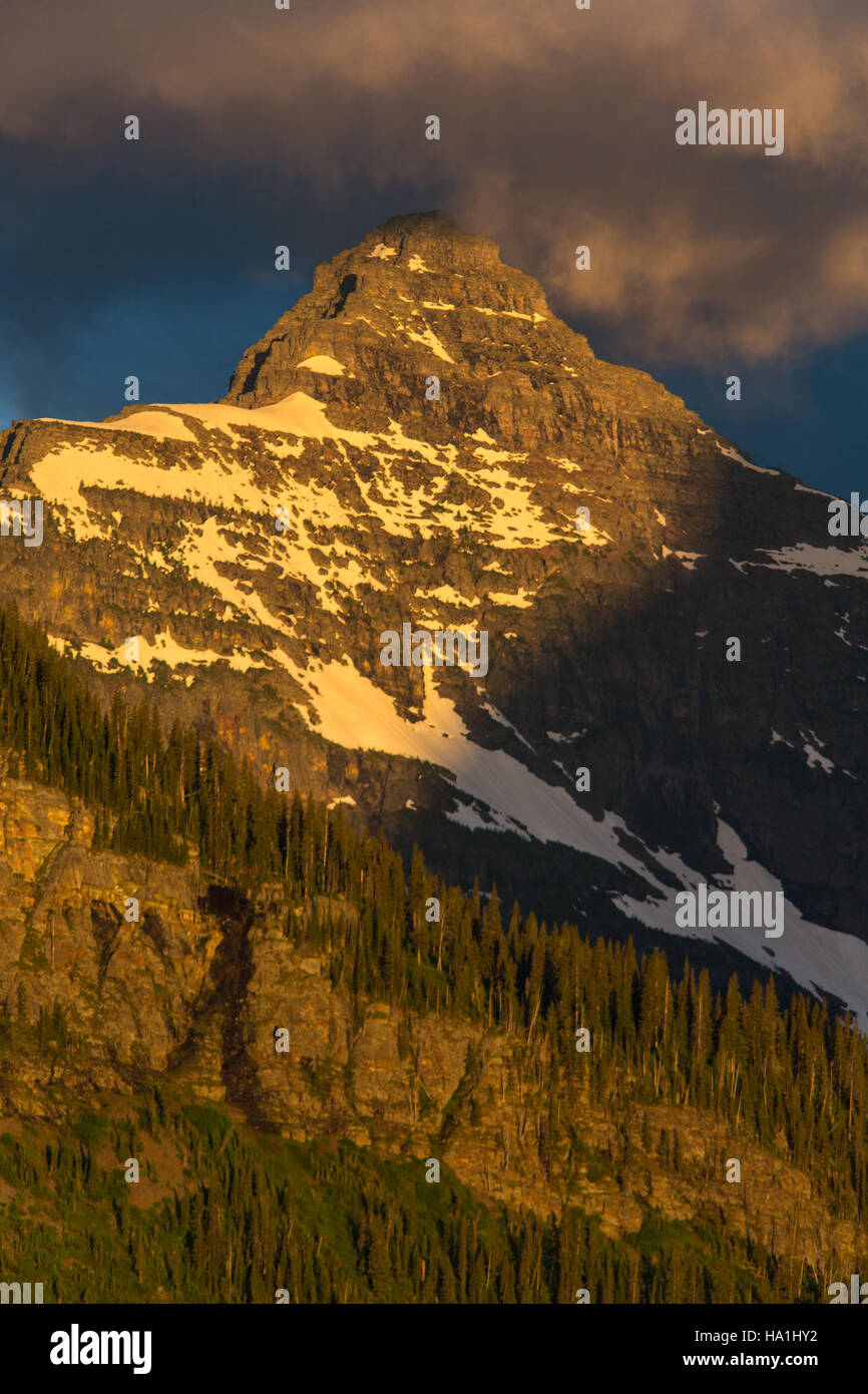 Lone Walker Mountain in Glacier National Park stands as a dramatic ...