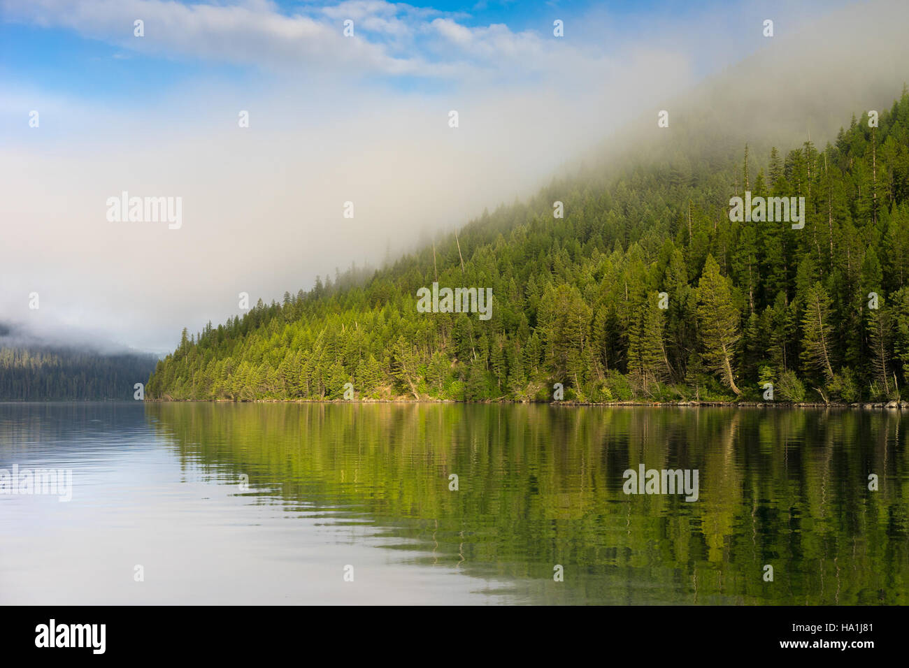 This image captures Quartz Lake in Glacier National Park on a foggy ...