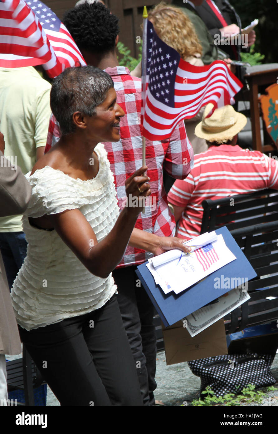 A naturalization ceremony, where new citizens take an oath of ...