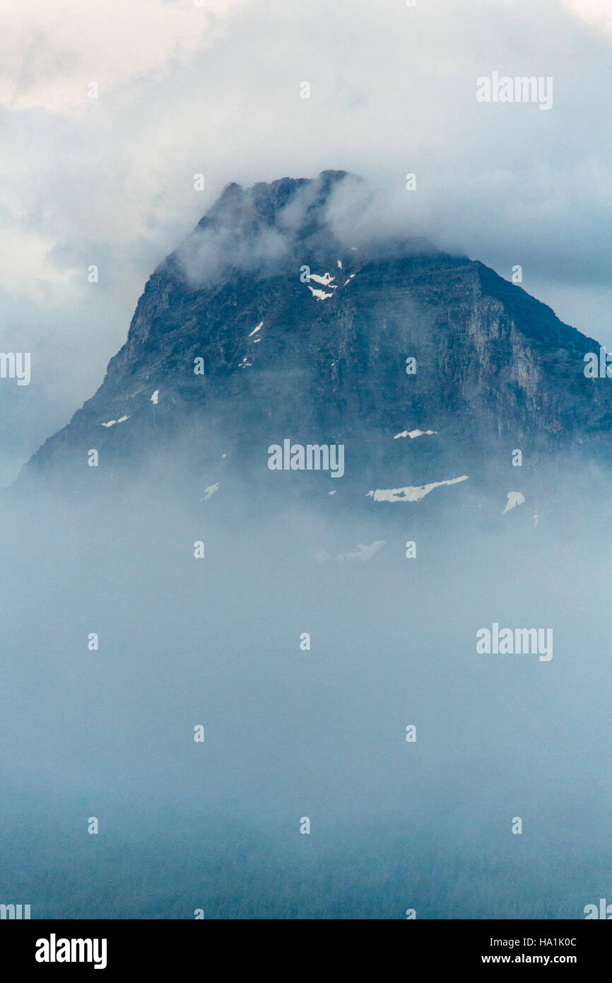 A portrait of Mount Edwards in Glacier National Park, shrouded in ...
