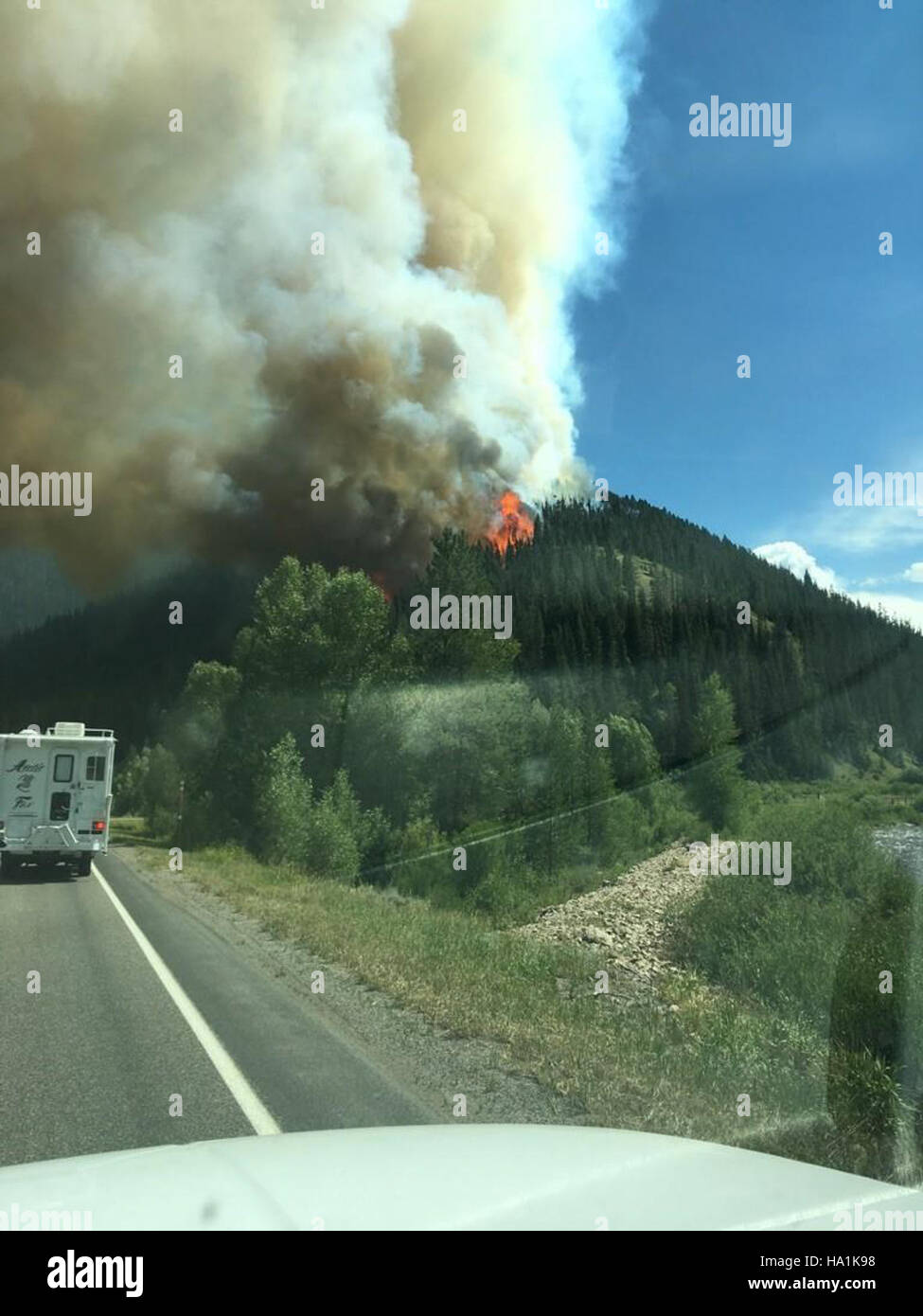 This image shows the aftermath of a wildfire in Wyoming, illustrating ...