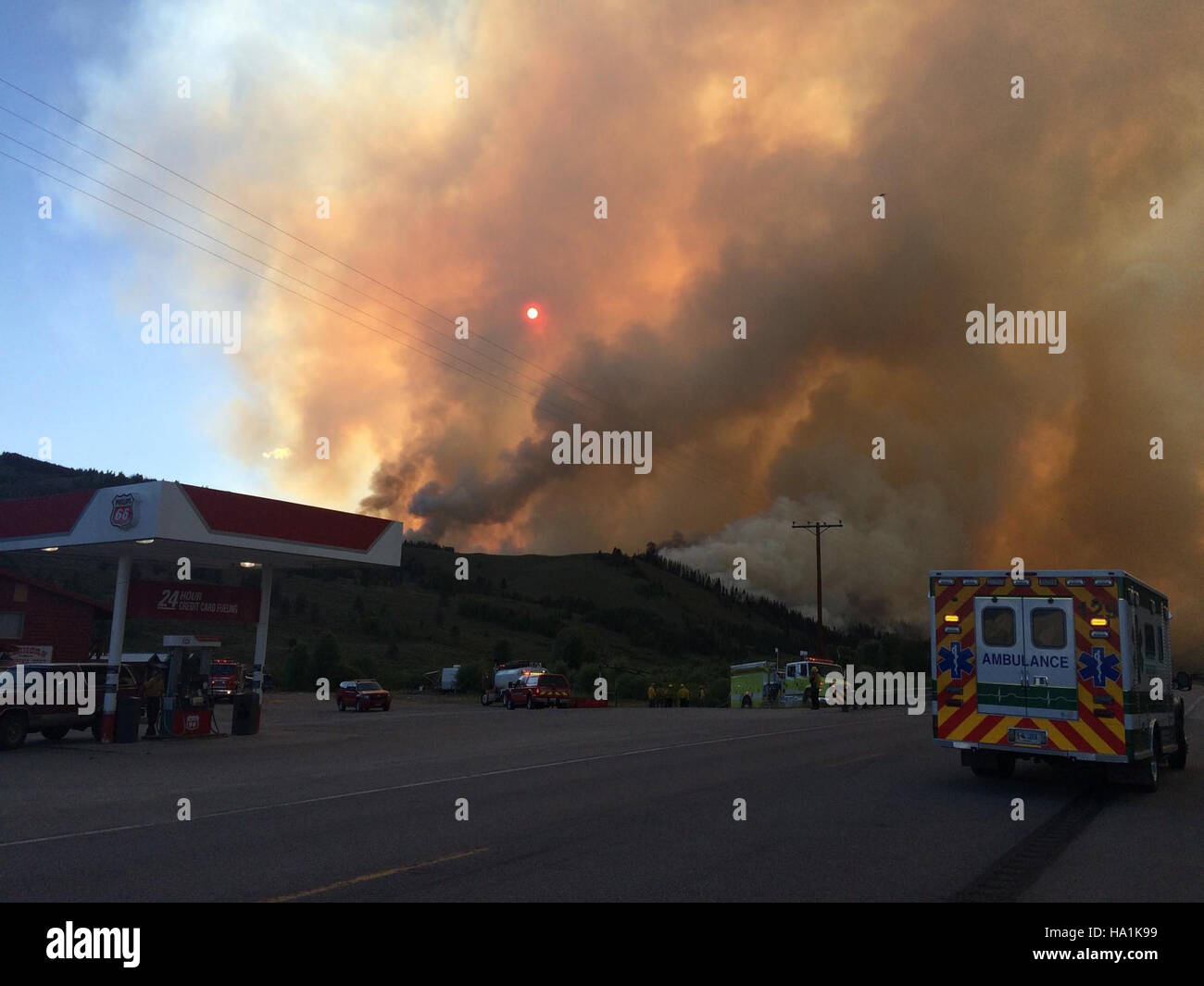 This image depicts a wildfire in Wyoming, showcasing the impact of fire ...