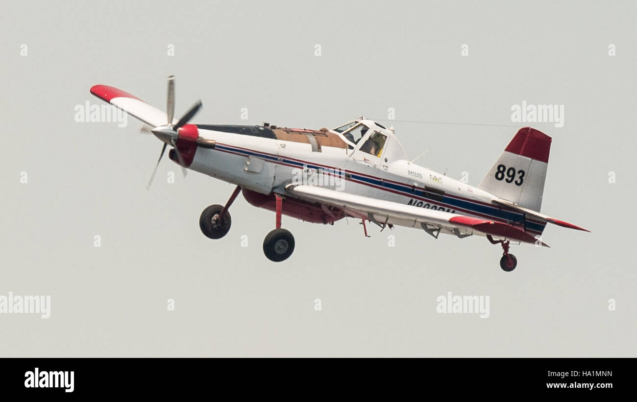 A Large Air Tanker (VLAT) drops retardant during wildfire suppression ...