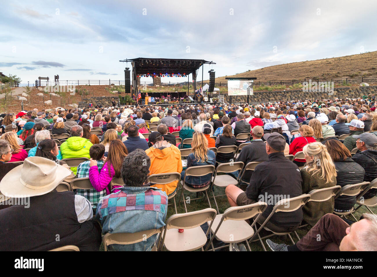A crowd gathers in Yellowstone National Park near the iconic Arch Park ...