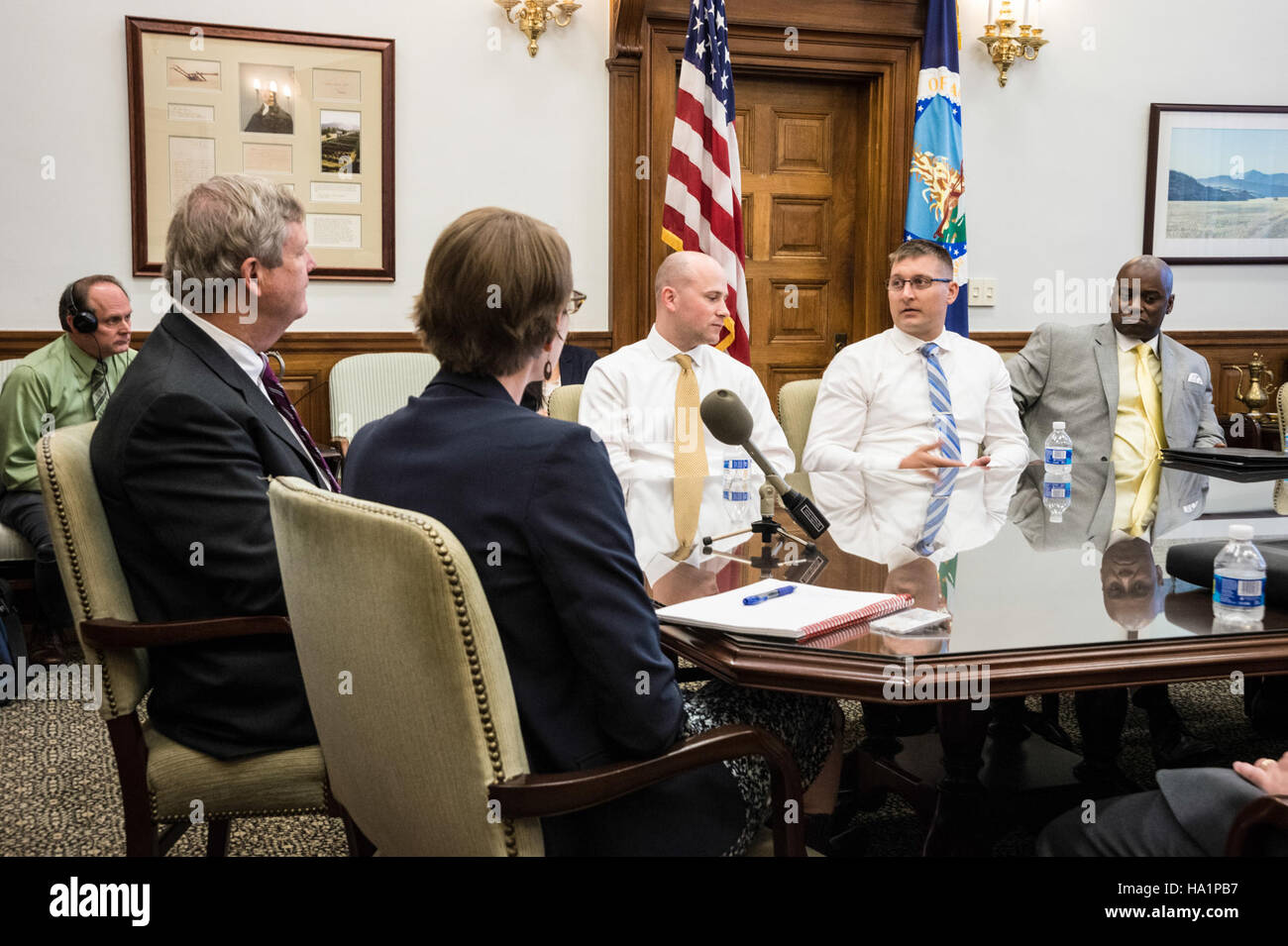 This image features a meeting in the Secretary's Conference Room at the ...
