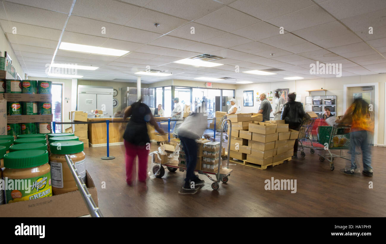 This image depicts a food distribution event organized by the U.S ...