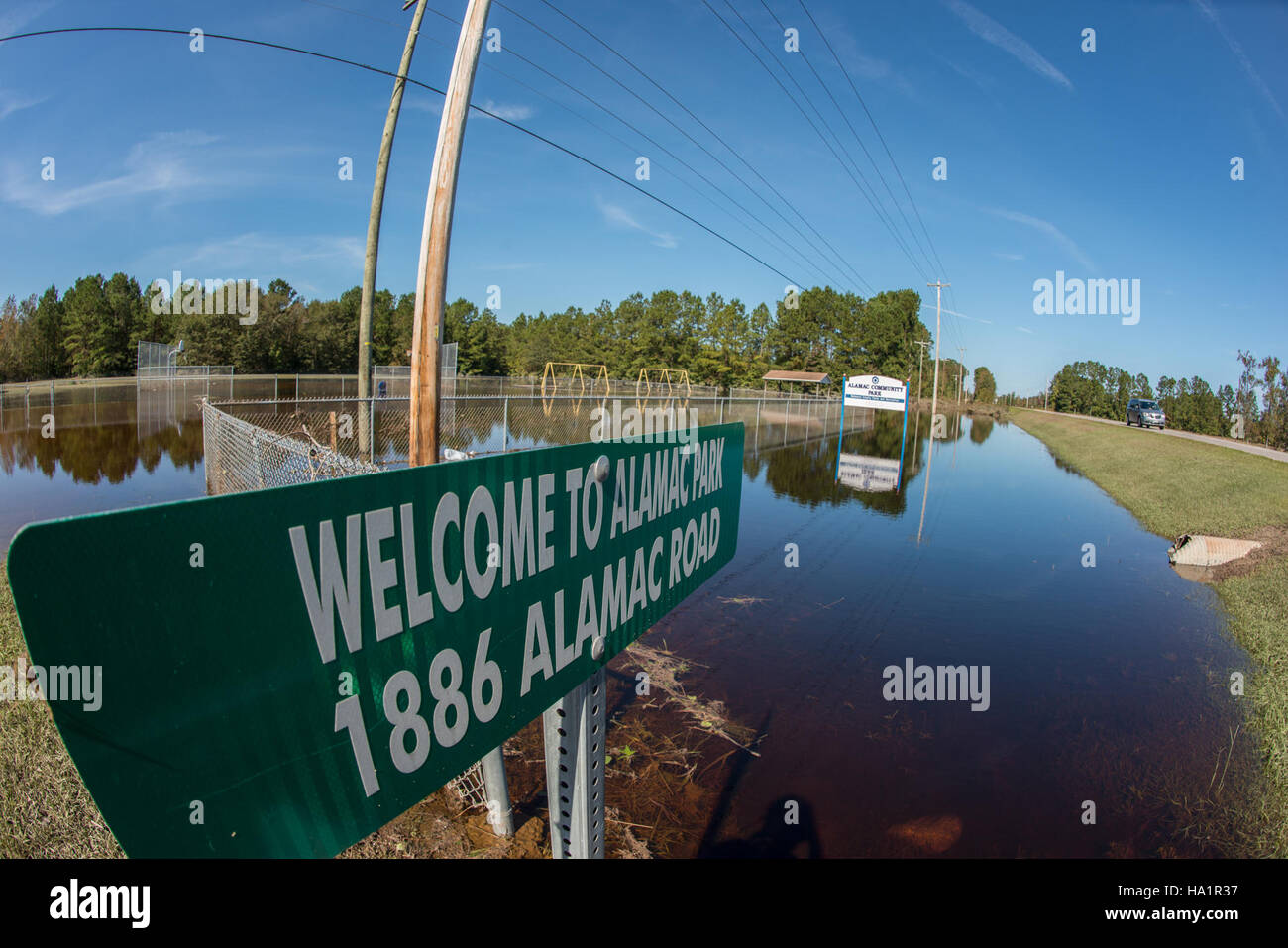 This image depicts the aftermath of Hurricane Matthew, showing recovery ...
