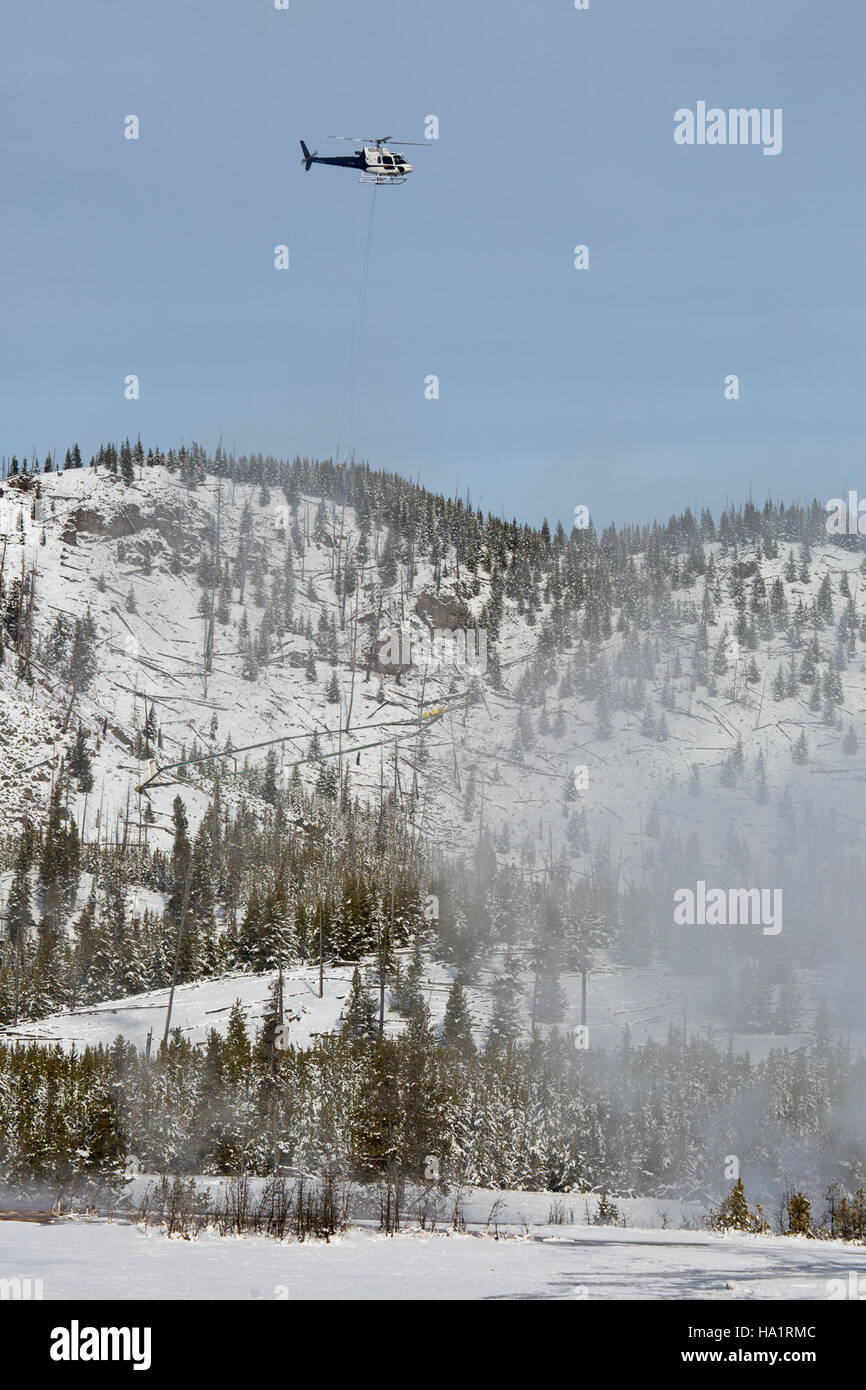 Helicopter flies lands in landscape hi-res stock photography and images ...