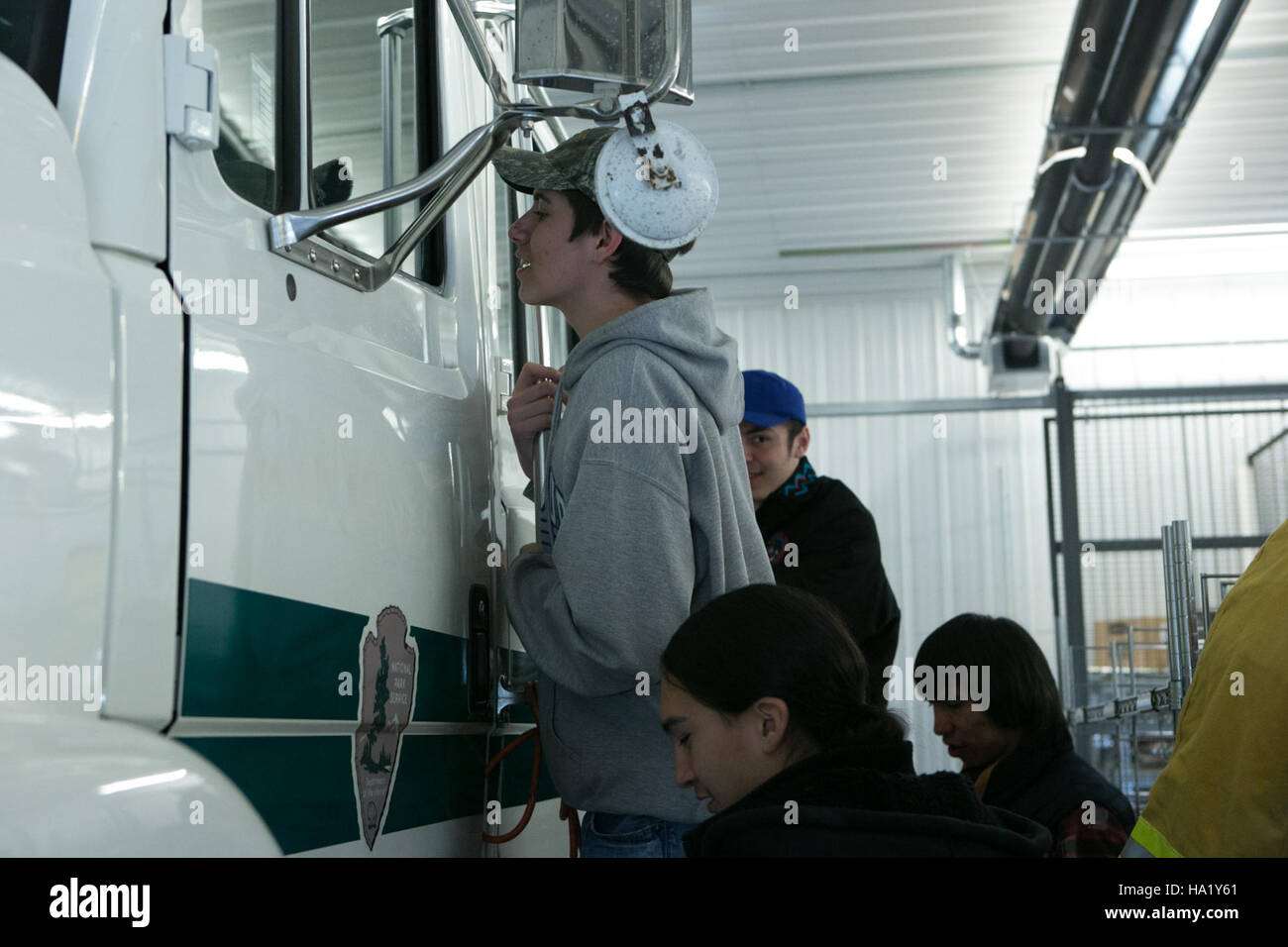 Youth camp participants explore the park’s historic fire engine at ...