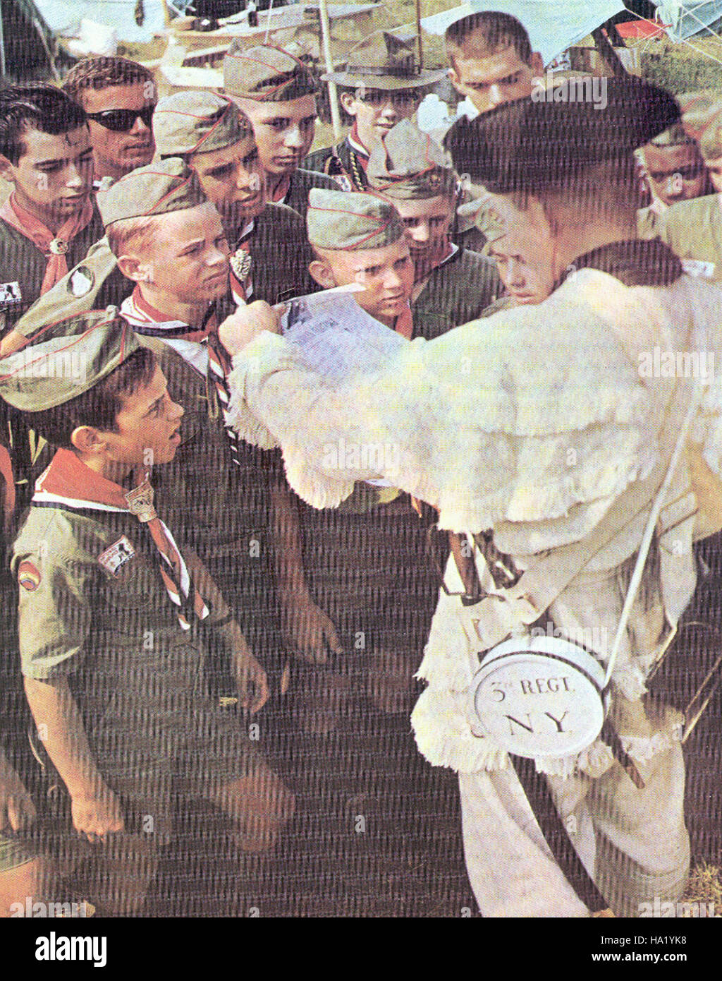 A Revolutionary War soldier reenactor stands in front of the historical ...