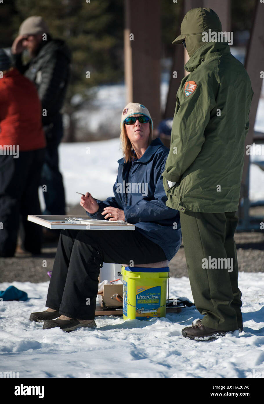 A park ranger interacts with a painting student at Denali National Park ...