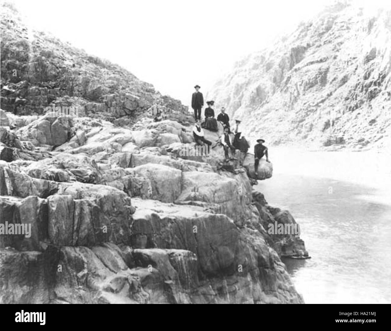This historic photograph from 1903 shows early visitors at Rust's Camp ...