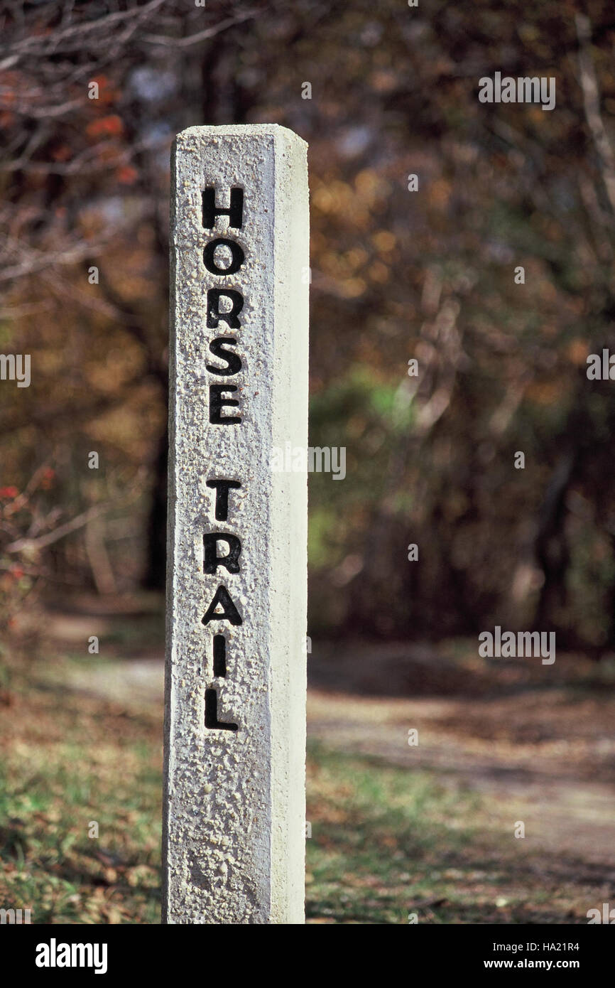A horse trail sign located in a national park provides important ...
