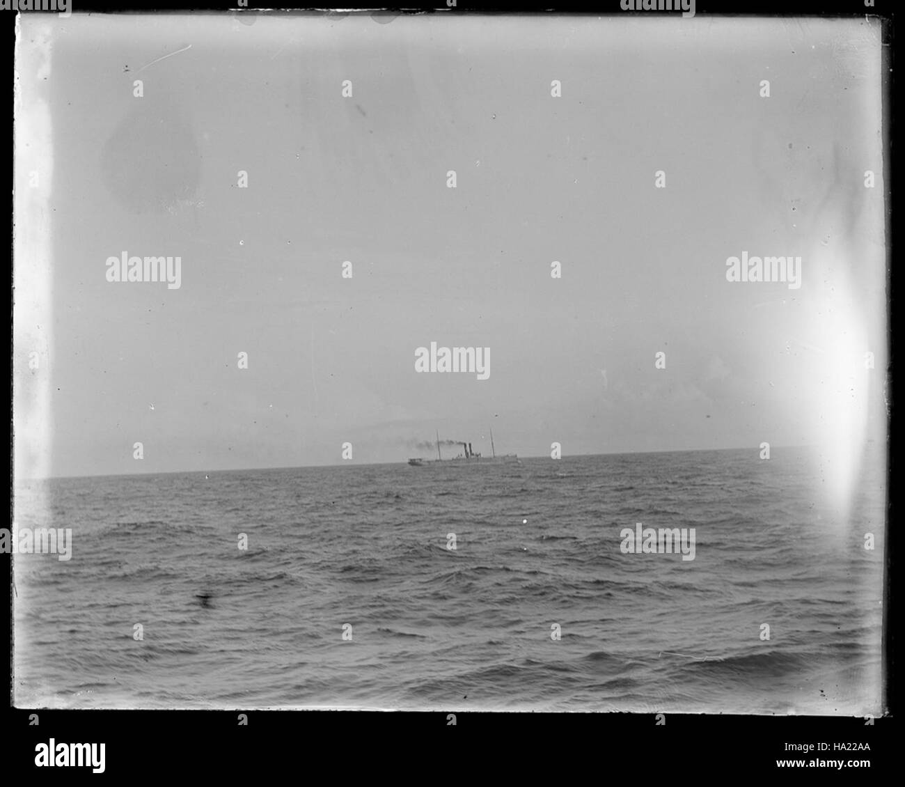 A historic cargo ship underway in the early 1900s, photographed from ...