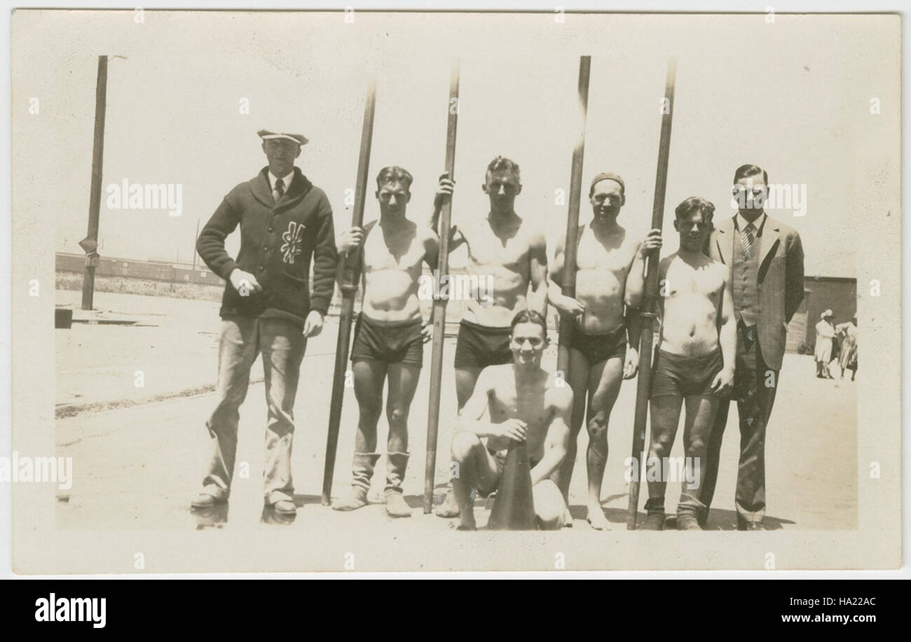 A historical photograph of a rowing crew and their coxswain, circa 1929 ...