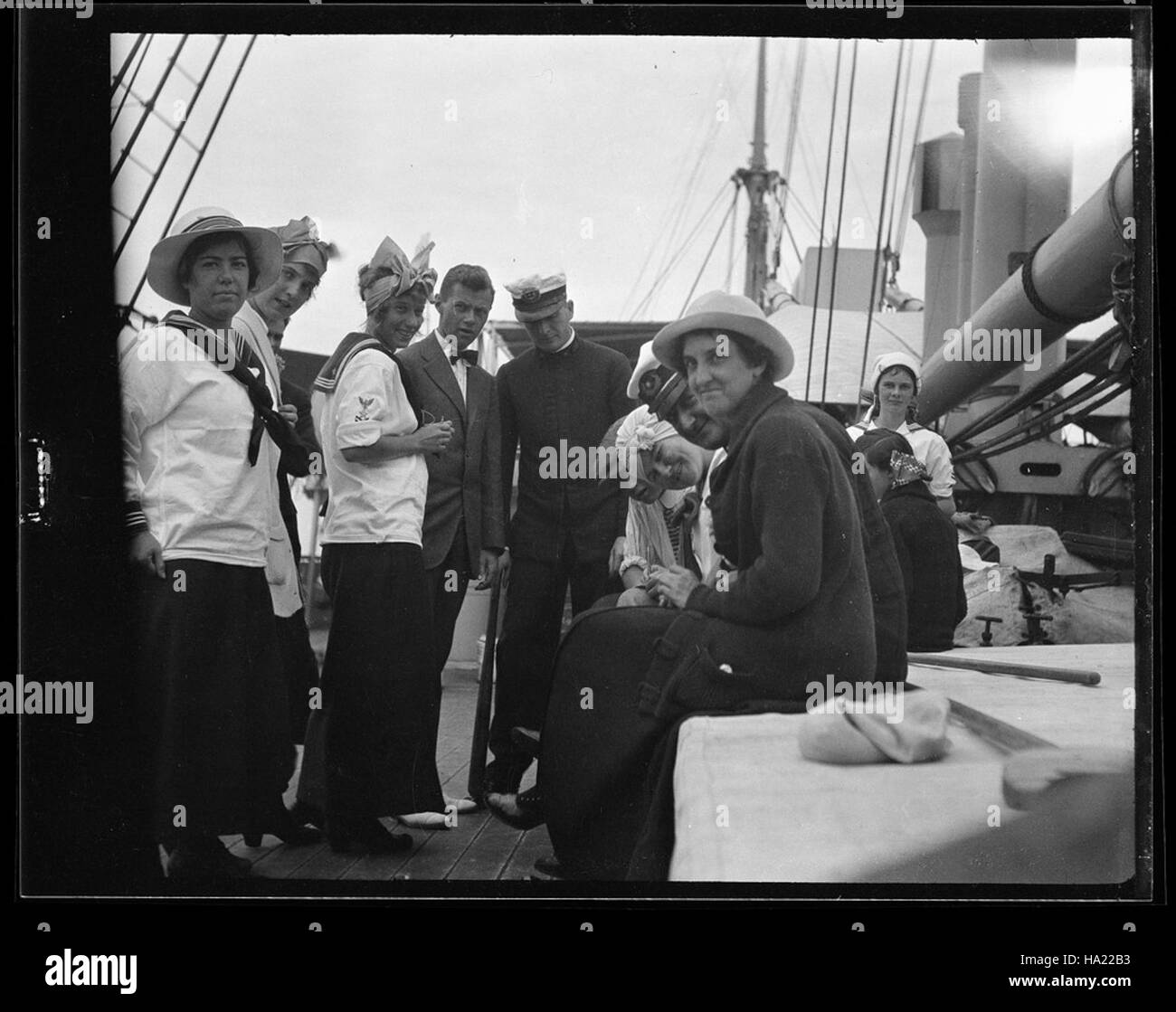Passengers and crew aboard the Manoa, a merchant vessel built in 1913 ...